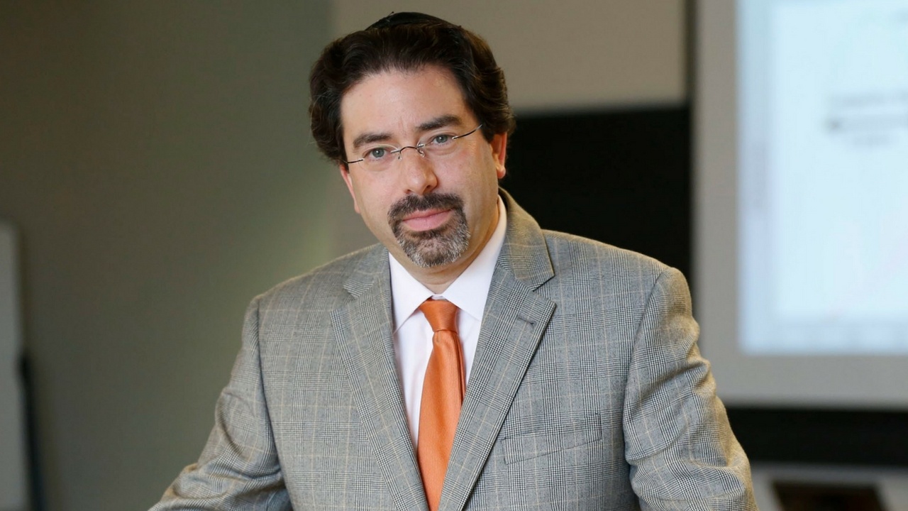 About Our Contributors - Dr. David Babbel